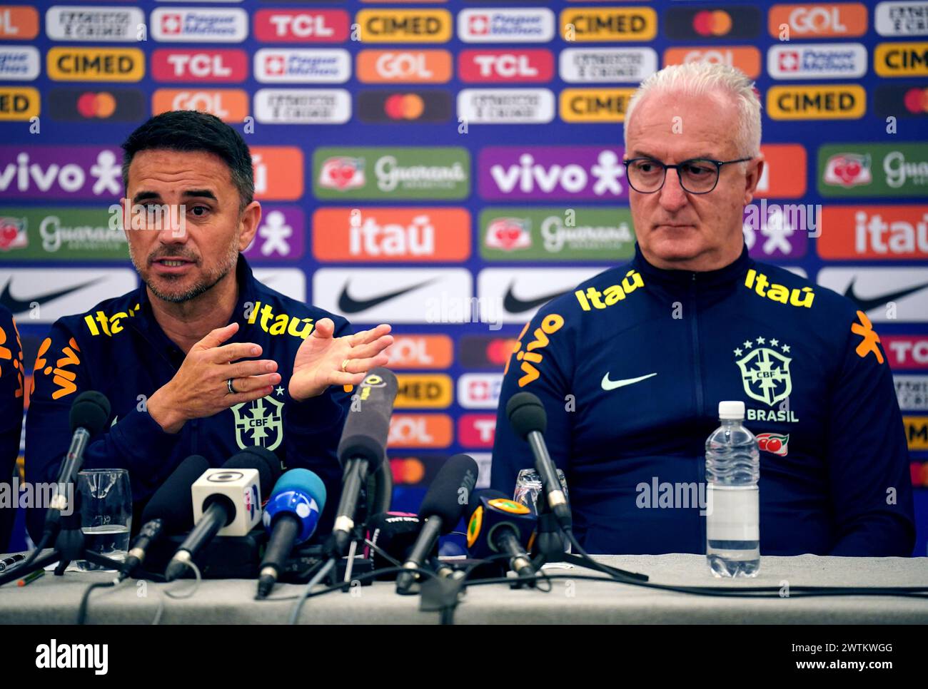 Rodrigo Caetano (left) and Brazil manager Dorival Junior during a press ...