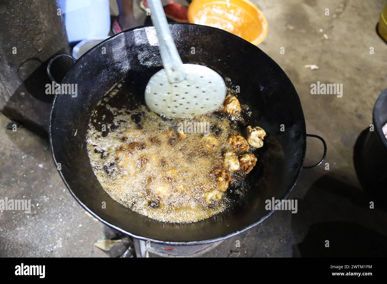 A fishmonger sells fish by the streets in Kibera Slum, Nairobi. Kibera ...