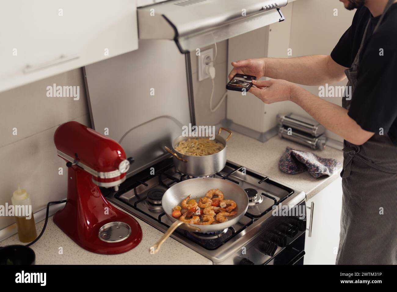 Cooking pasta seafood in home hi-res stock photography and images - Alamy