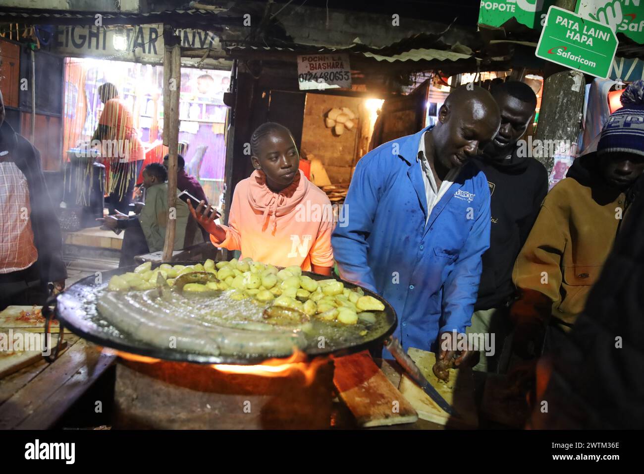 Residents enjoy eating Mutura (an intestine-encased mixture of minced ...