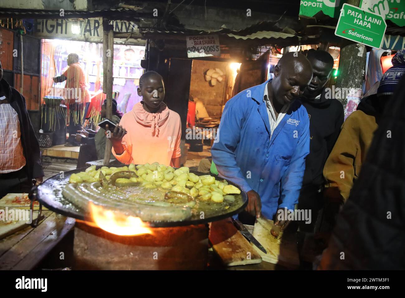 Residents enjoy eating Mutura (an intestine-encased mixture of minced ...