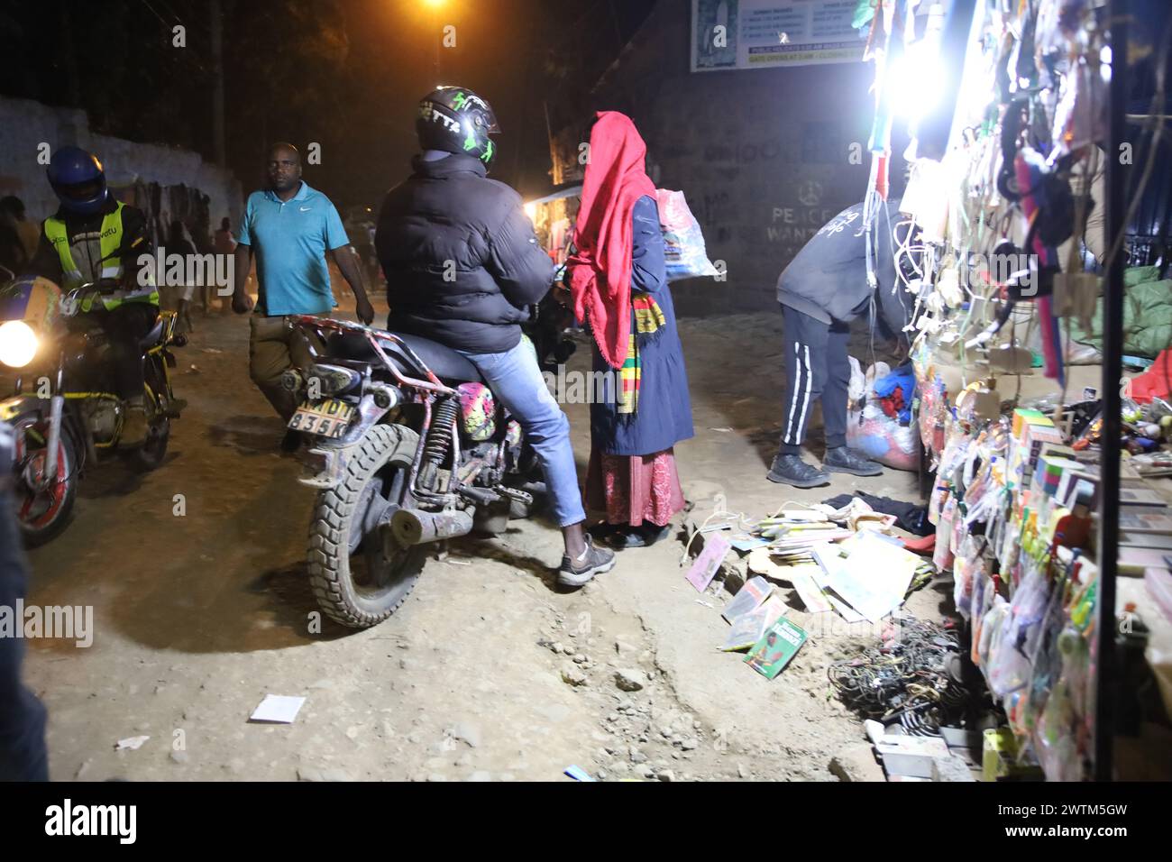 Residents are having a late evening conversation by the busy streets of ...