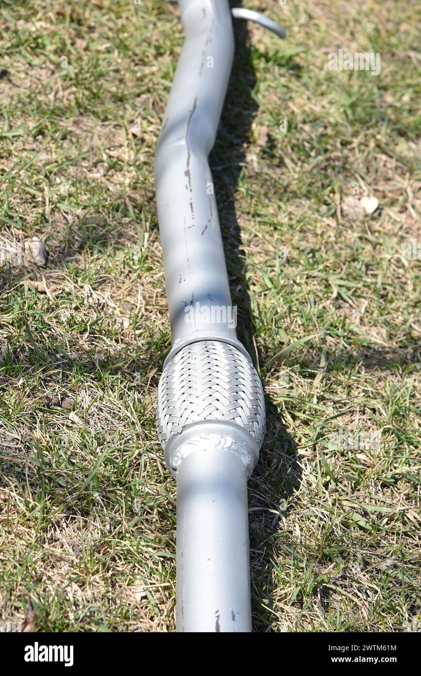 New Iron exhaust pipe car resonator Stock Photo - Alamy