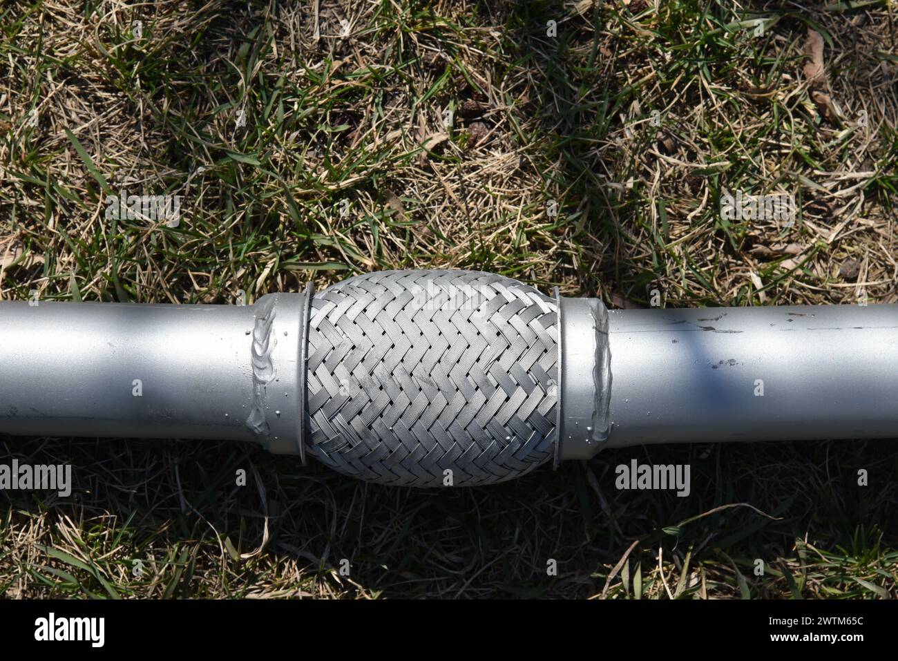 New Iron exhaust pipe car resonator Stock Photo - Alamy