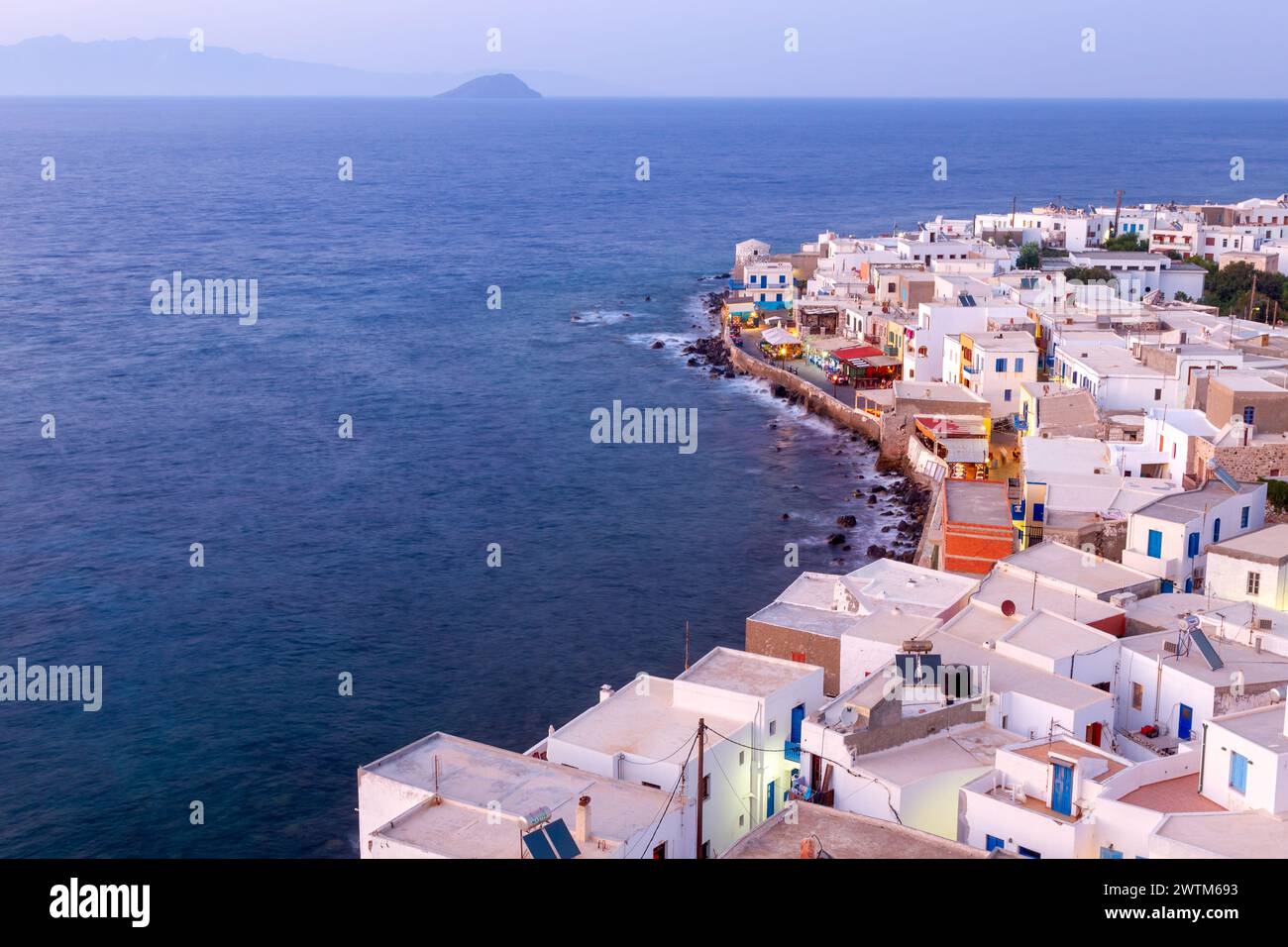 Panoramic view during blue hour of Mandraki village, a beautiful ...