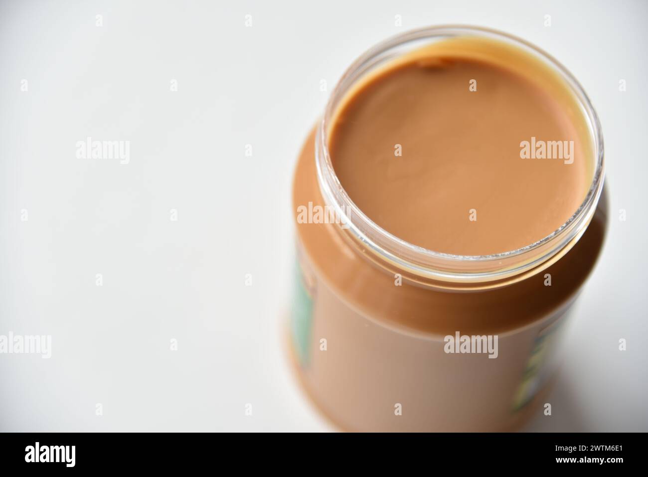 A full jar of nut paste in the kitchen Stock Photo - Alamy