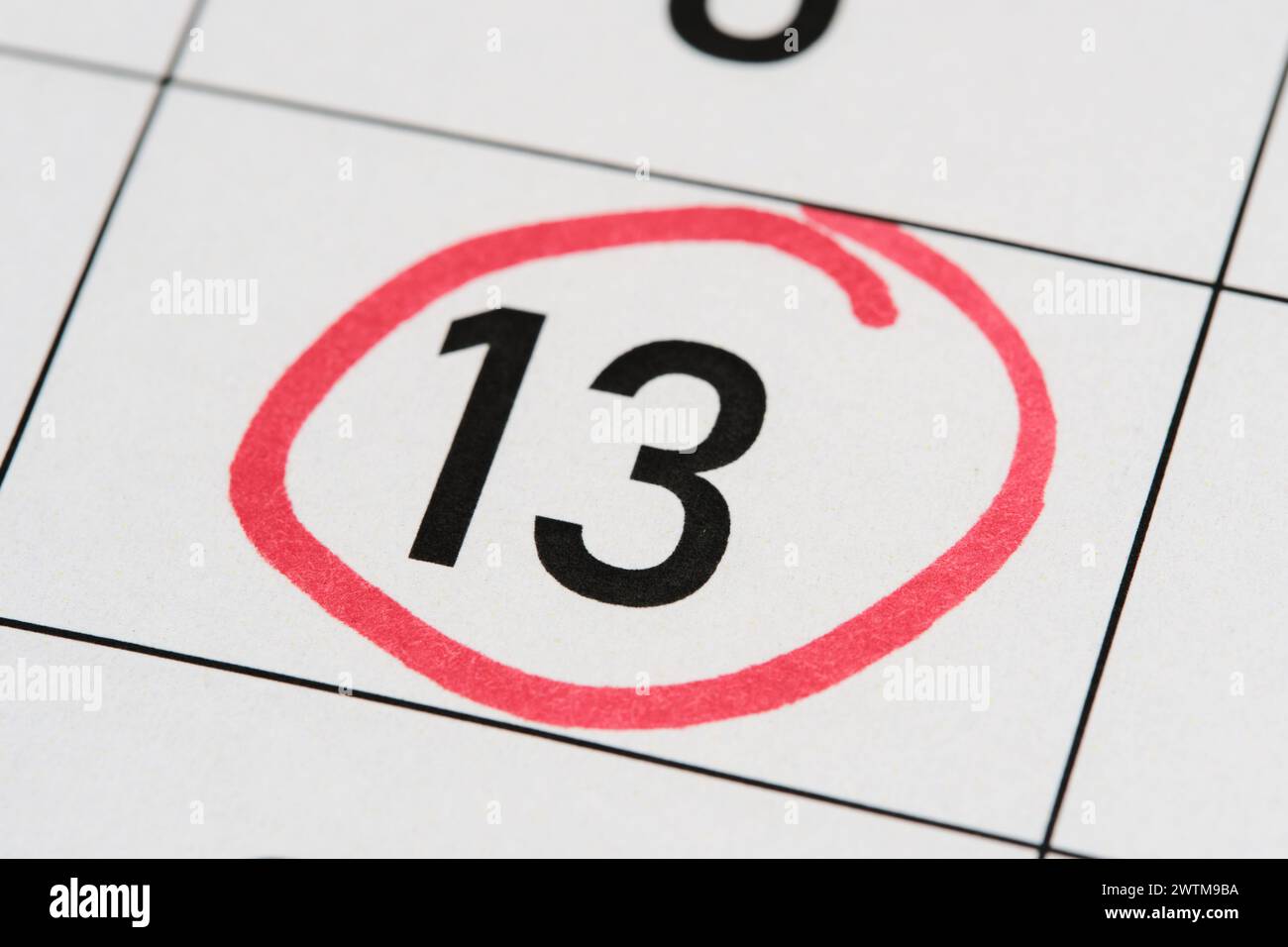 13th number on the calendar is marked in red Stock Photo - Alamy