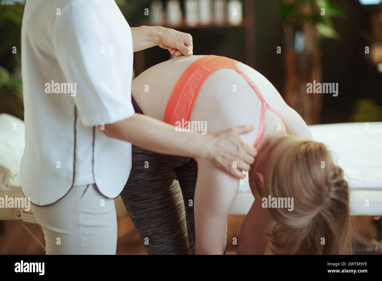 Healthcare Time Closeup On Female Medical Massage Therapist In Massage