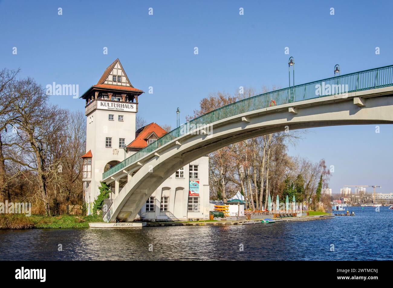 Berlin, Germany, March 6, 2024: elegant arch of a pedestrian bridge ...