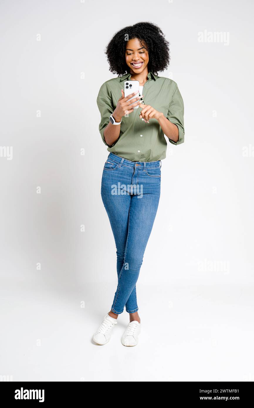 An African-American woman with a captivating smile, deeply engrossed in ...