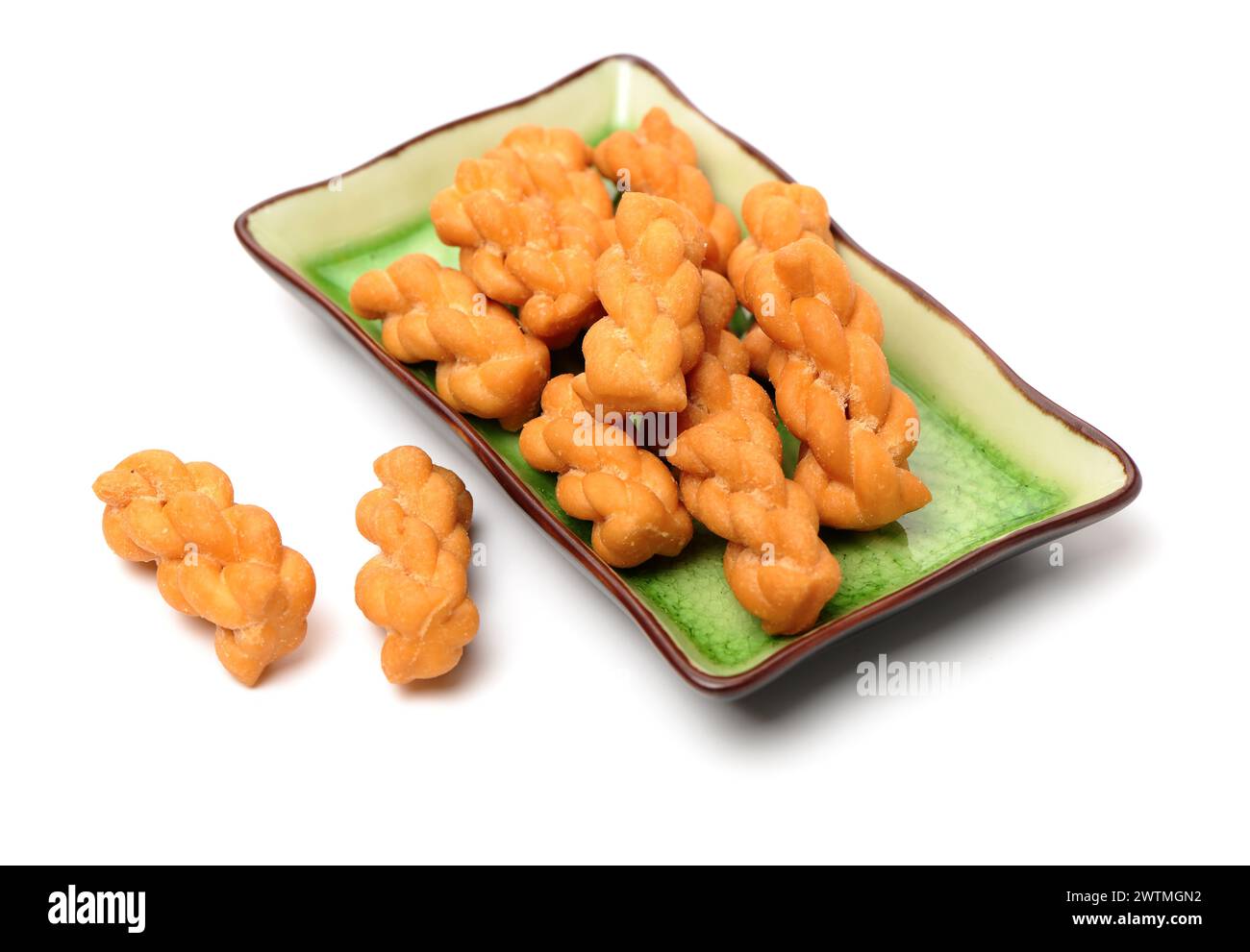 Chinese fried dough twist on white background Stock Photo - Alamy