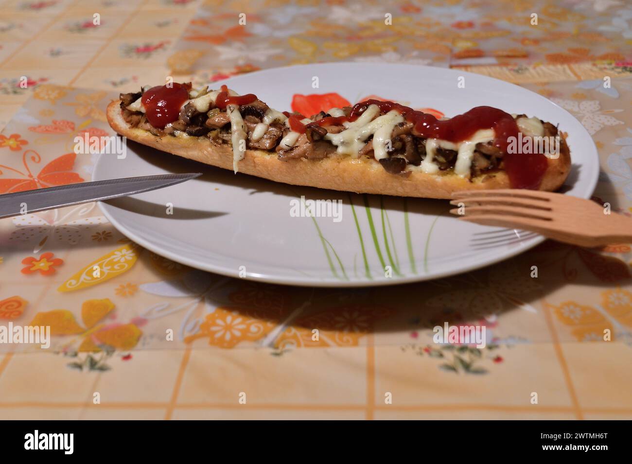 Traditional Polish fast food pancake homemade with salami and tomatoes ...