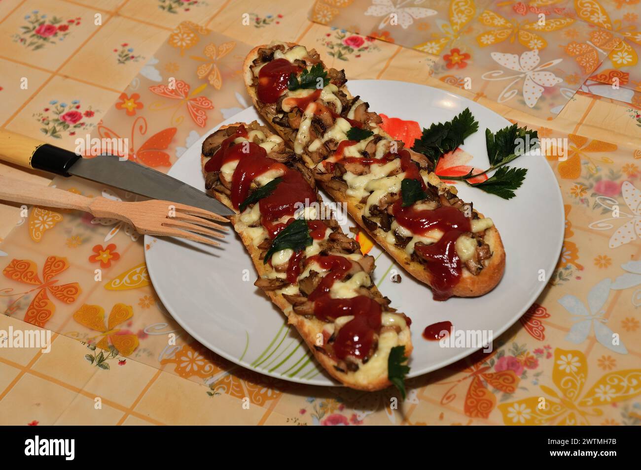 Traditional Polish fast food pancake homemade with salami and tomatoes ...