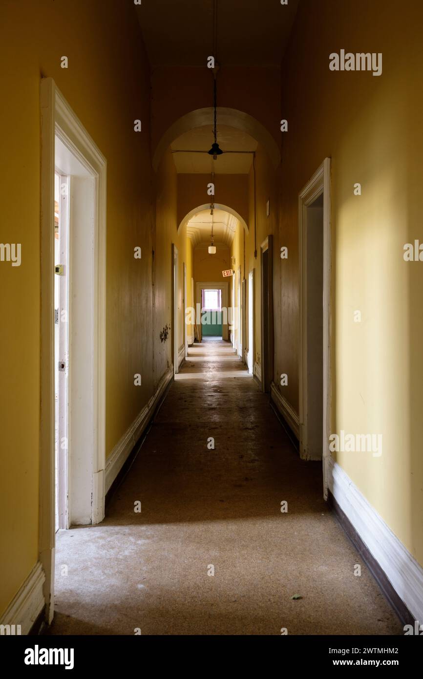 A long yellow hallway Stock Photo - Alamy