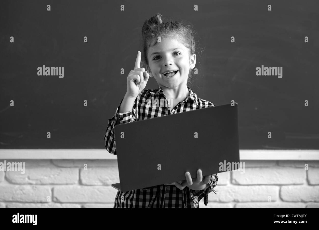 School girl studying math during online lesson in classroom, online ...
