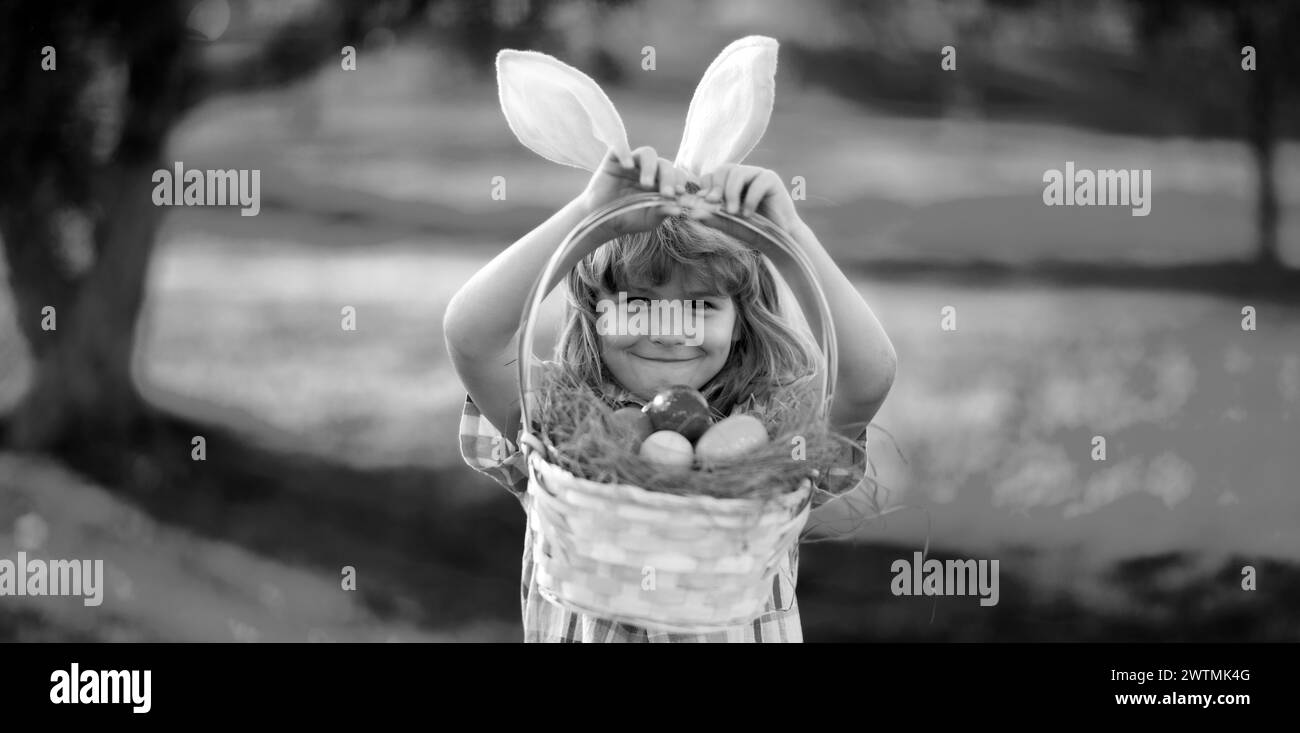 Child boy hunting easter eggs. Child boy with easter eggs and bunny ...