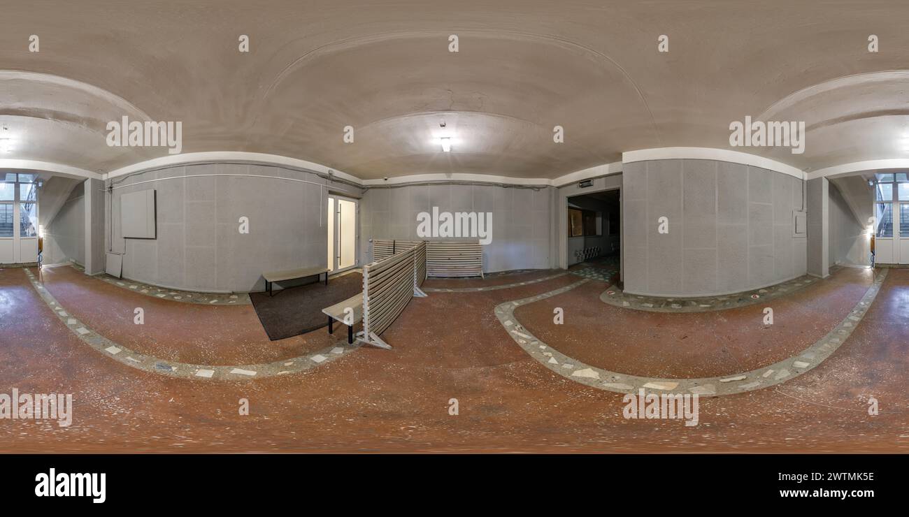 empty waiting and rest room basement without repair with benches in ...