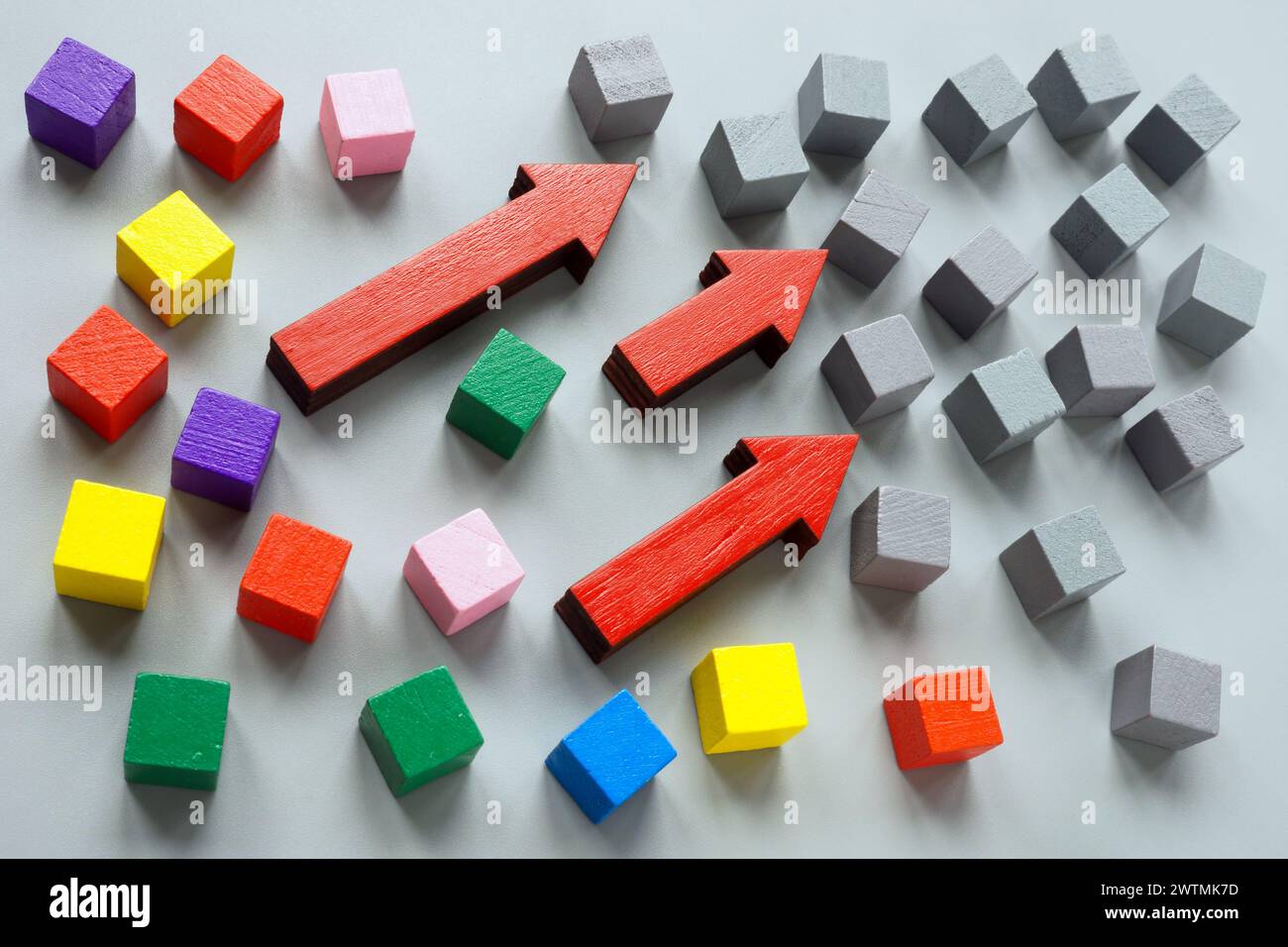 Gray cubes, arrows and colored ones as a symbol of diversity and ...