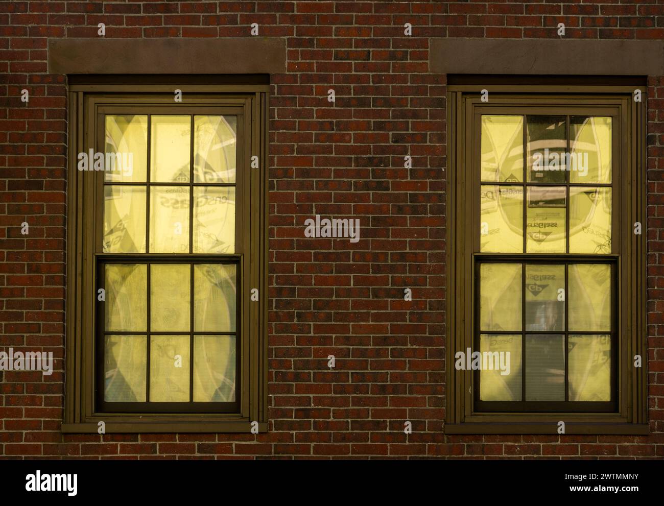 abstract window reflections in a red brick building in the west end ...