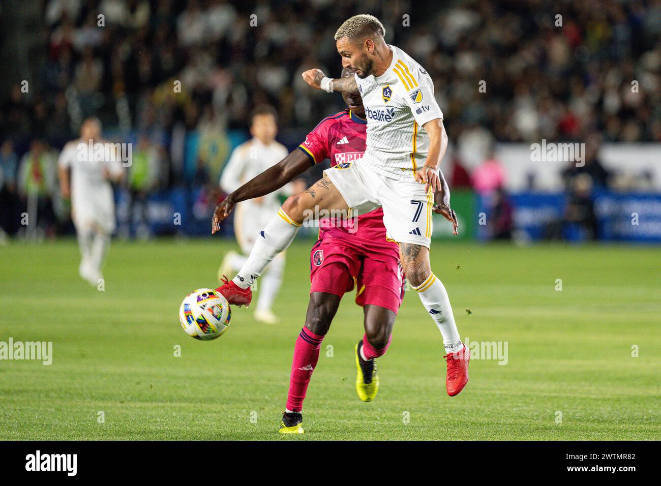 Los Angeles Galaxy midfielder Diego Fagúndez (7) is defended by St ...