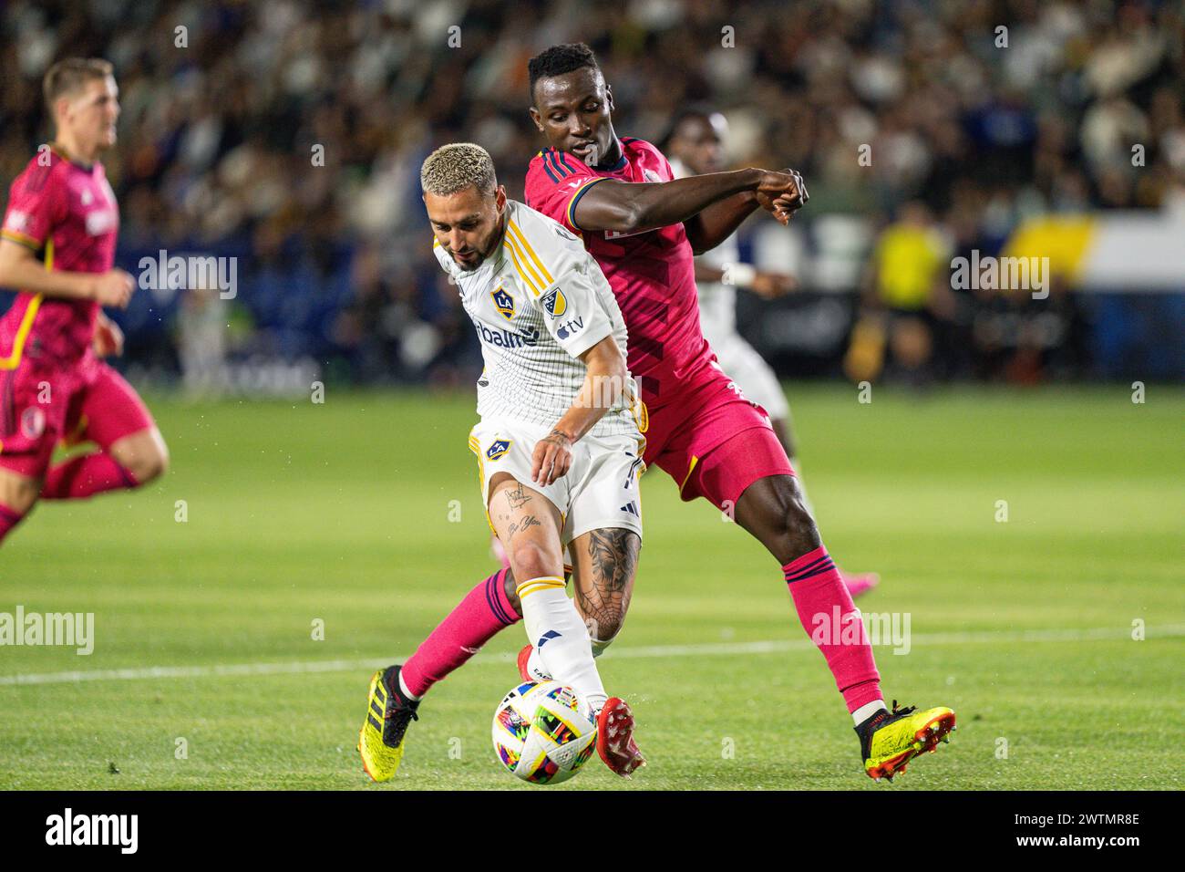 Los Angeles Galaxy midfielder Diego Fagúndez (7) is defended by St ...