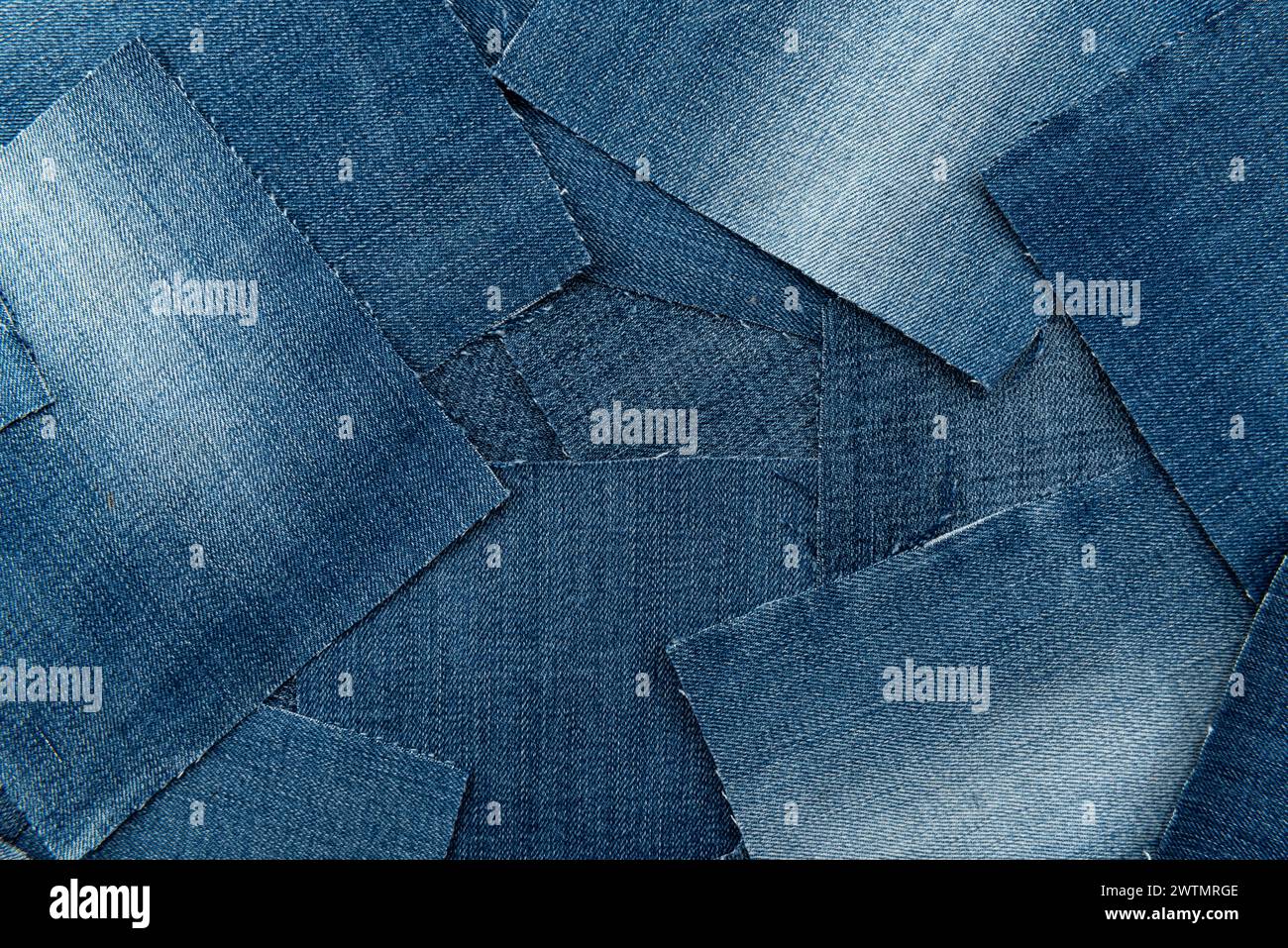 Texture from torn pieces of denim. Jeans texture. Material for sewing ...