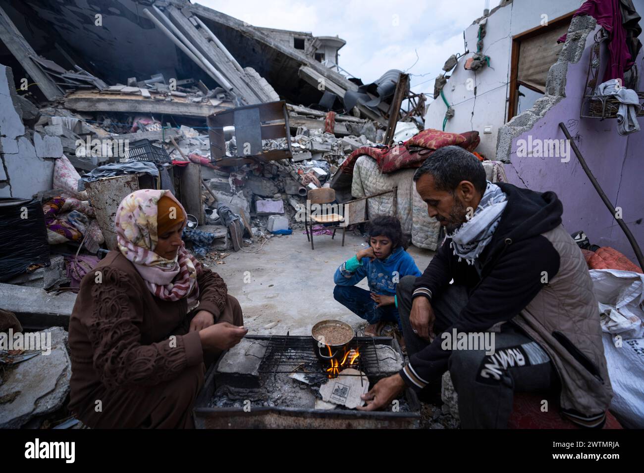 Members of the Al-Rabaya family break their fast during the Muslim holy ...