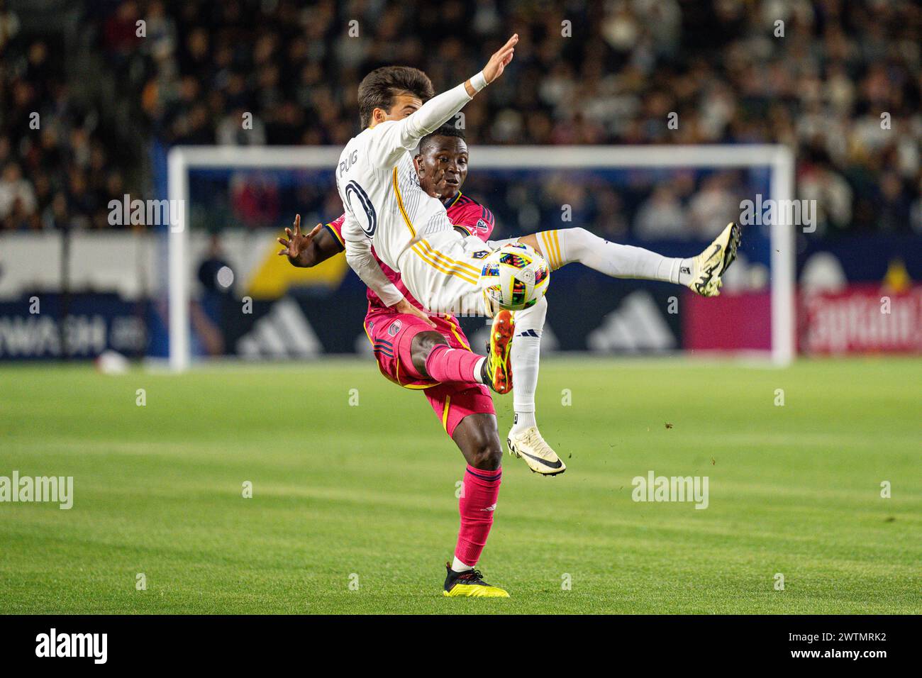 Los Angeles Galaxy midfielder Riqui Puig (10) is fouled by St. Louis ...