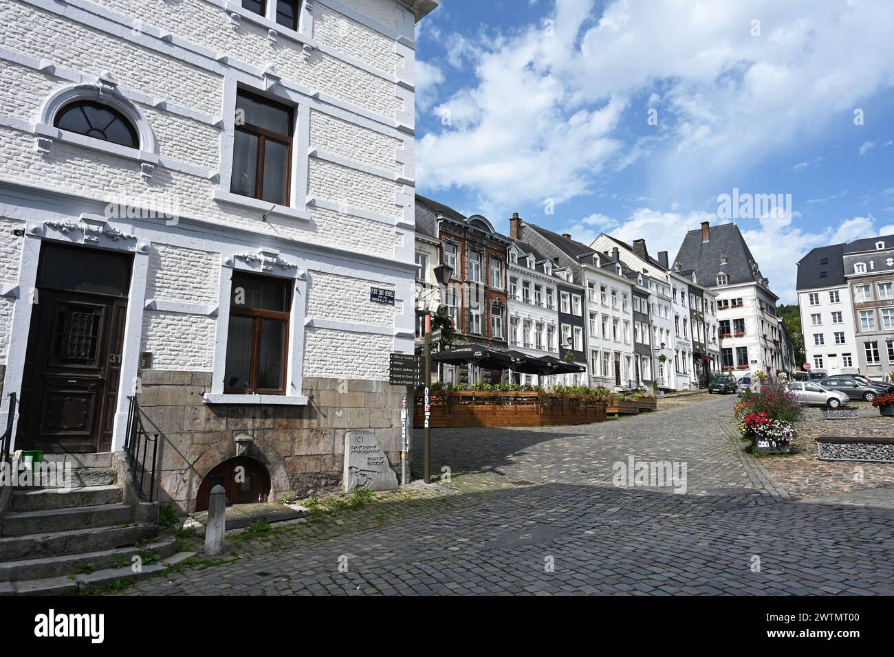 Stavelot town square with fountain and flower boxes Stock Photo - Alamy