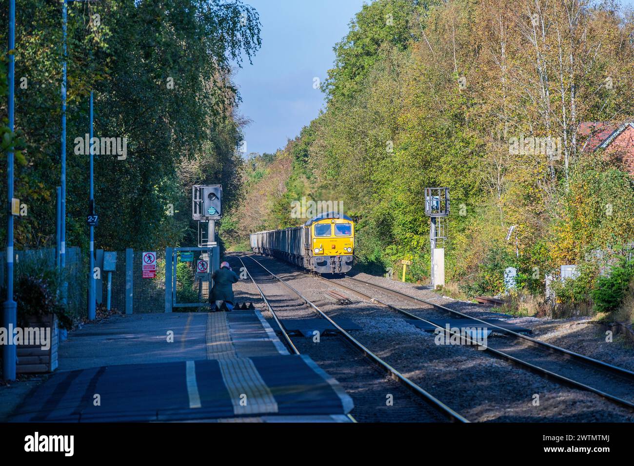 Diesel powered passenger Commuter suburban railway station. Freight ...