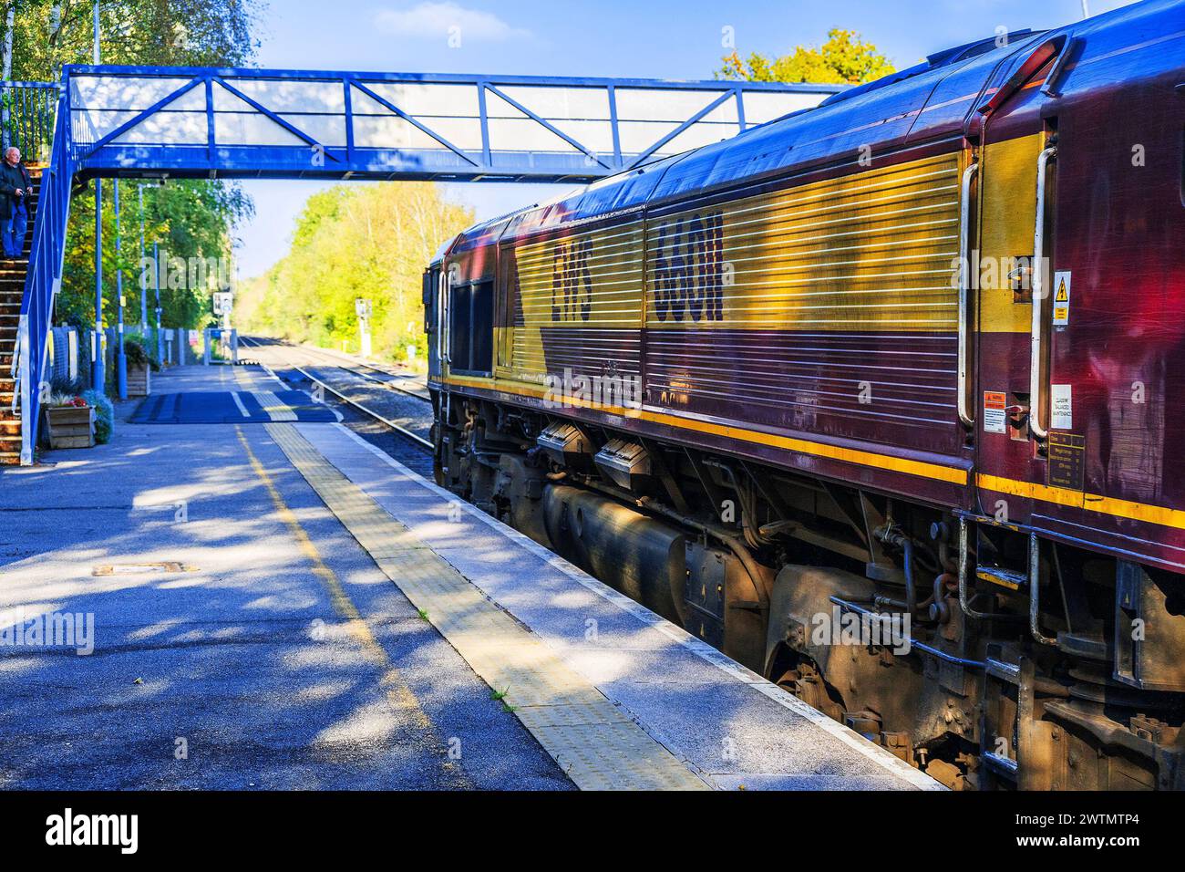 Diesel powered passenger Commuter suburban railway station. Freight ...