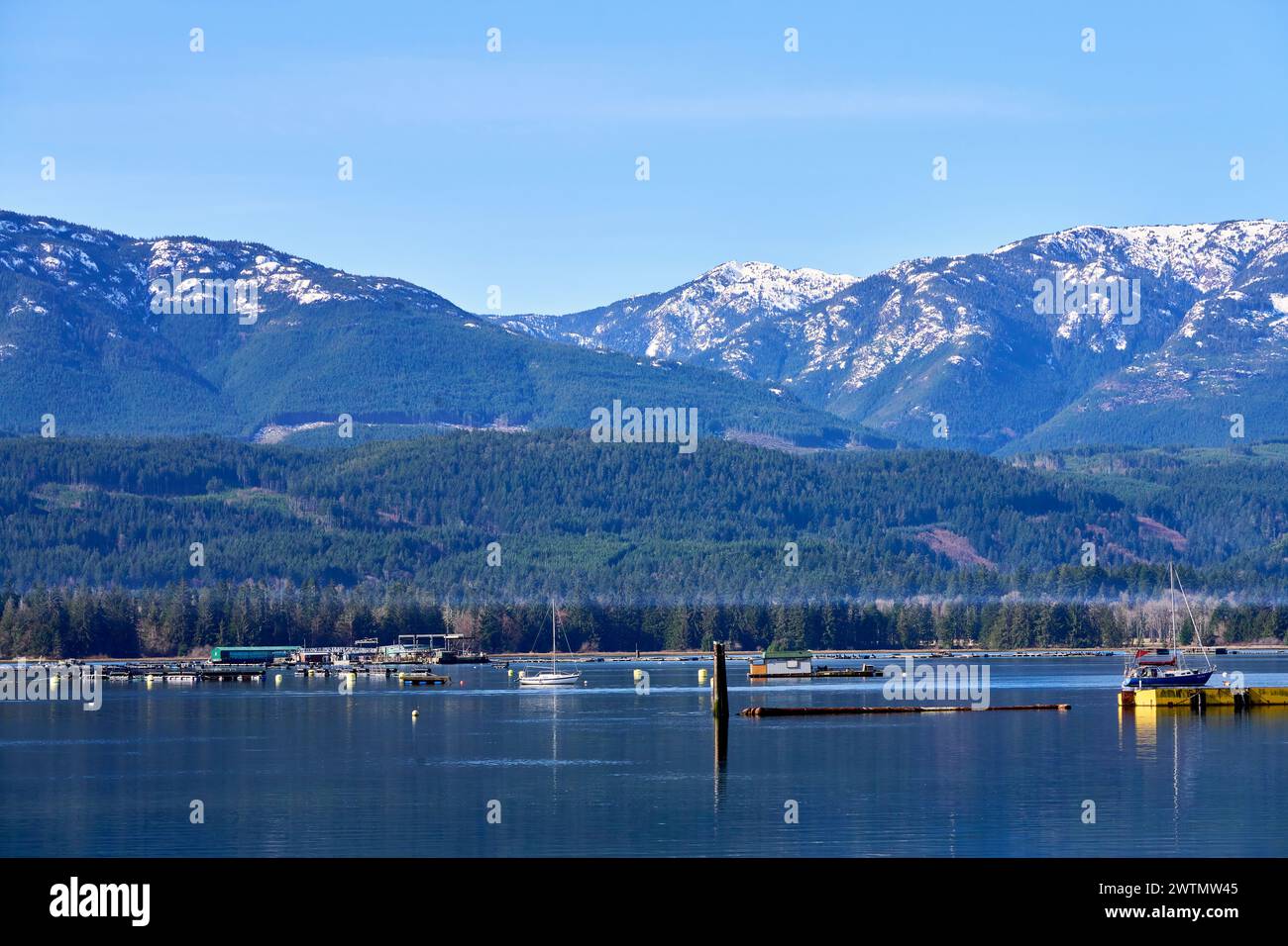 View of snow covered Vancouver Island mountains from Deep Bay Marina ...