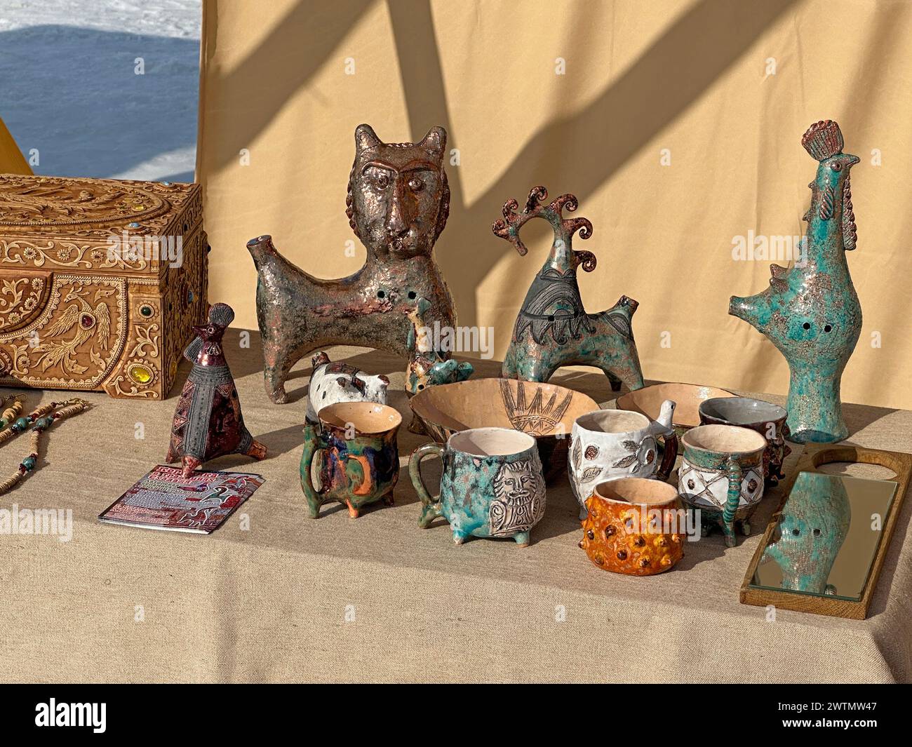 Suzdal, Russia, March 16, 2024 Sale of clay souvenirs, folk art ...