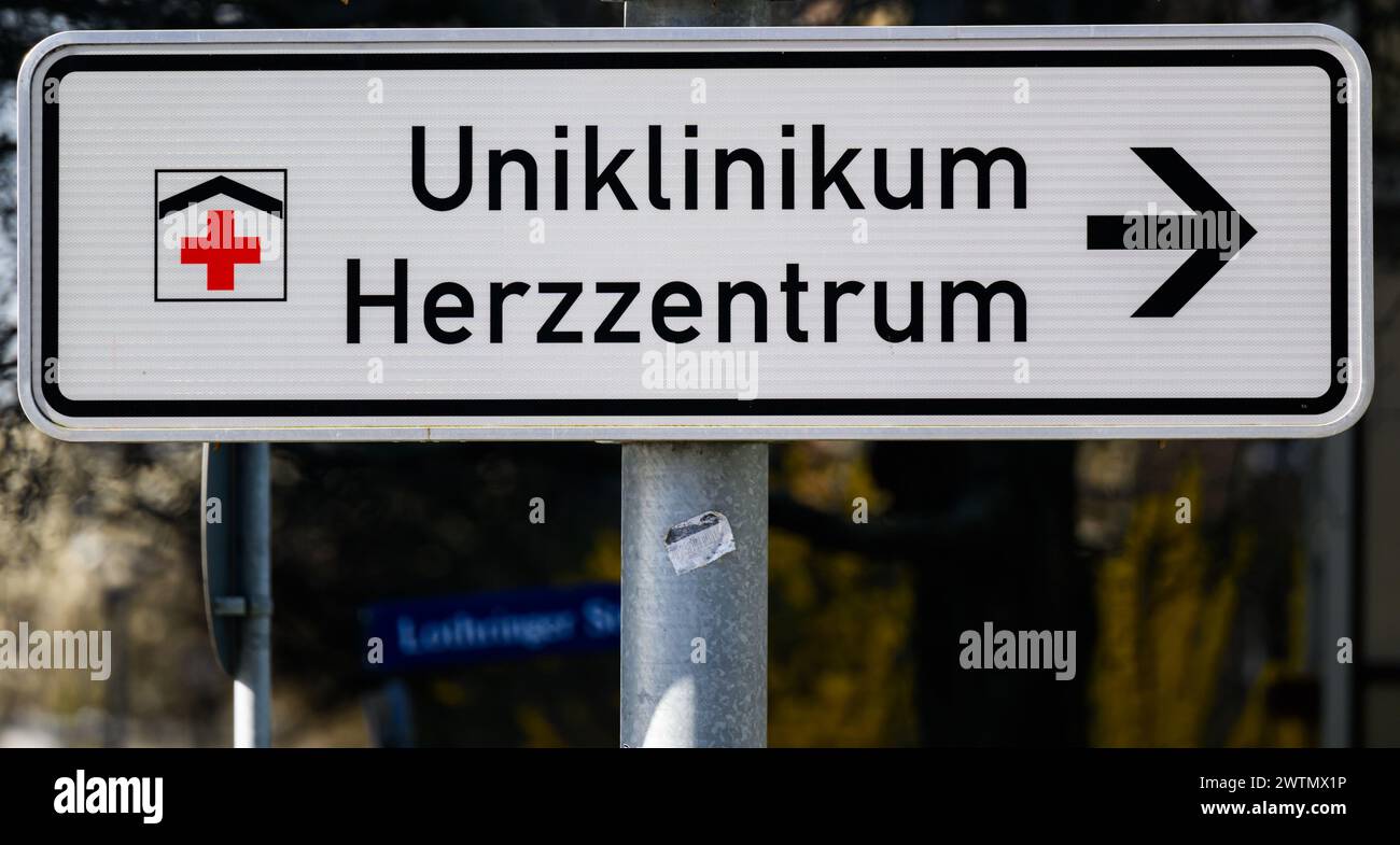 Dresden, Germany. 18th Mar, 2024. A sign with an arrow pointing to the ...