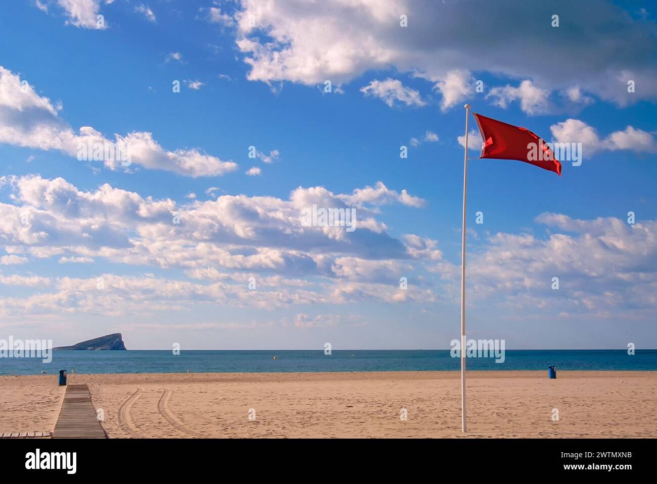 Red flag on Benidorm's beach Stock Photo - Alamy