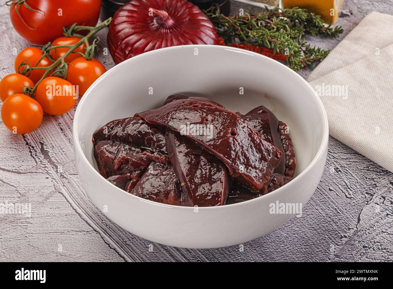 Raw dietary beef liver slices for cooking Stock Photo - Alamy