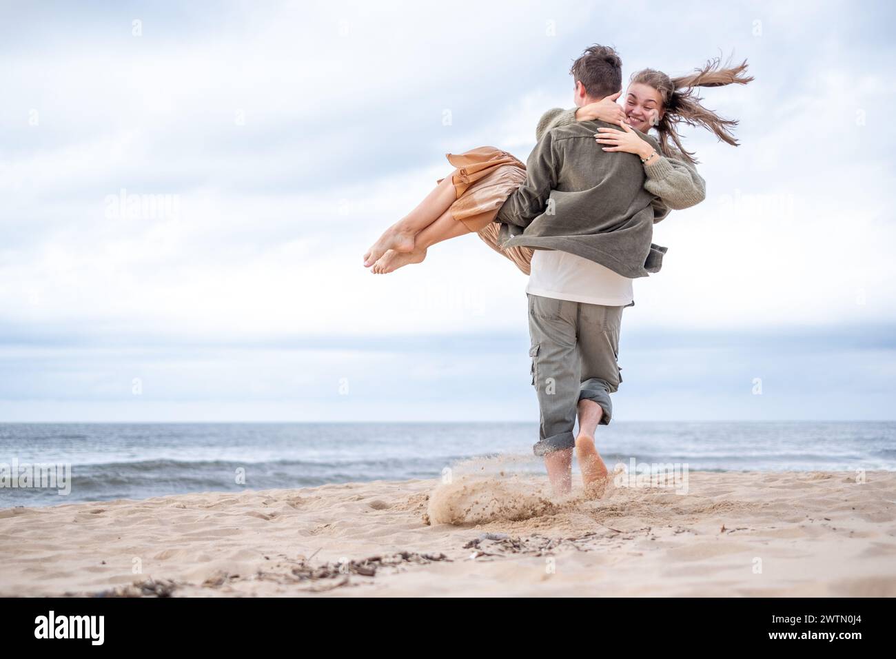 A Young Couple Shares A Joyful Moment Man Caring His Bride Both Happy