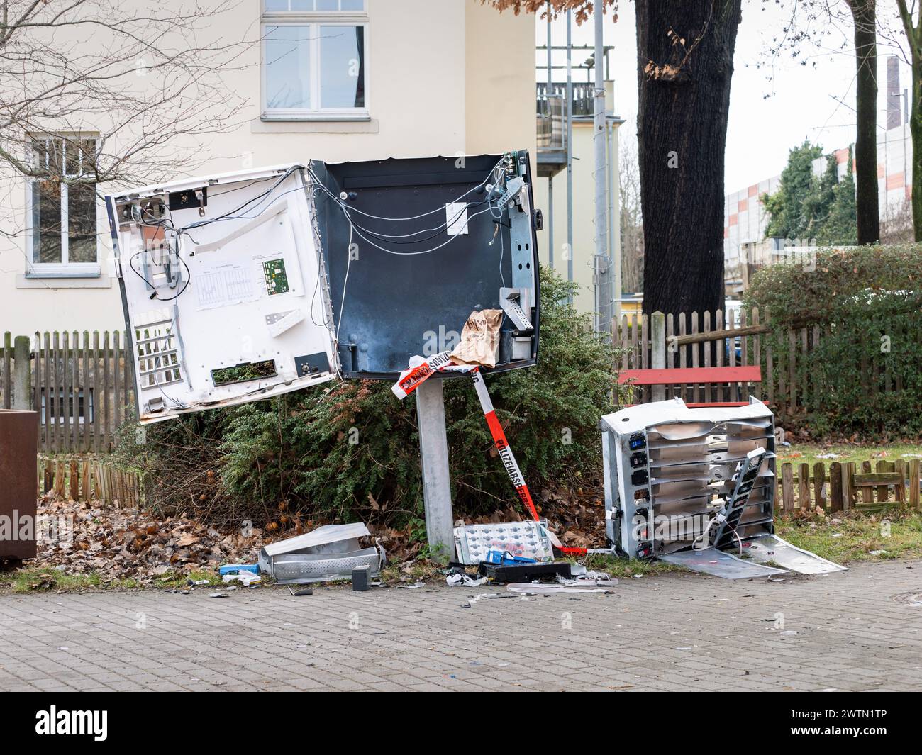 Destroyed cigarette machine due to an explosion. The front door is ...