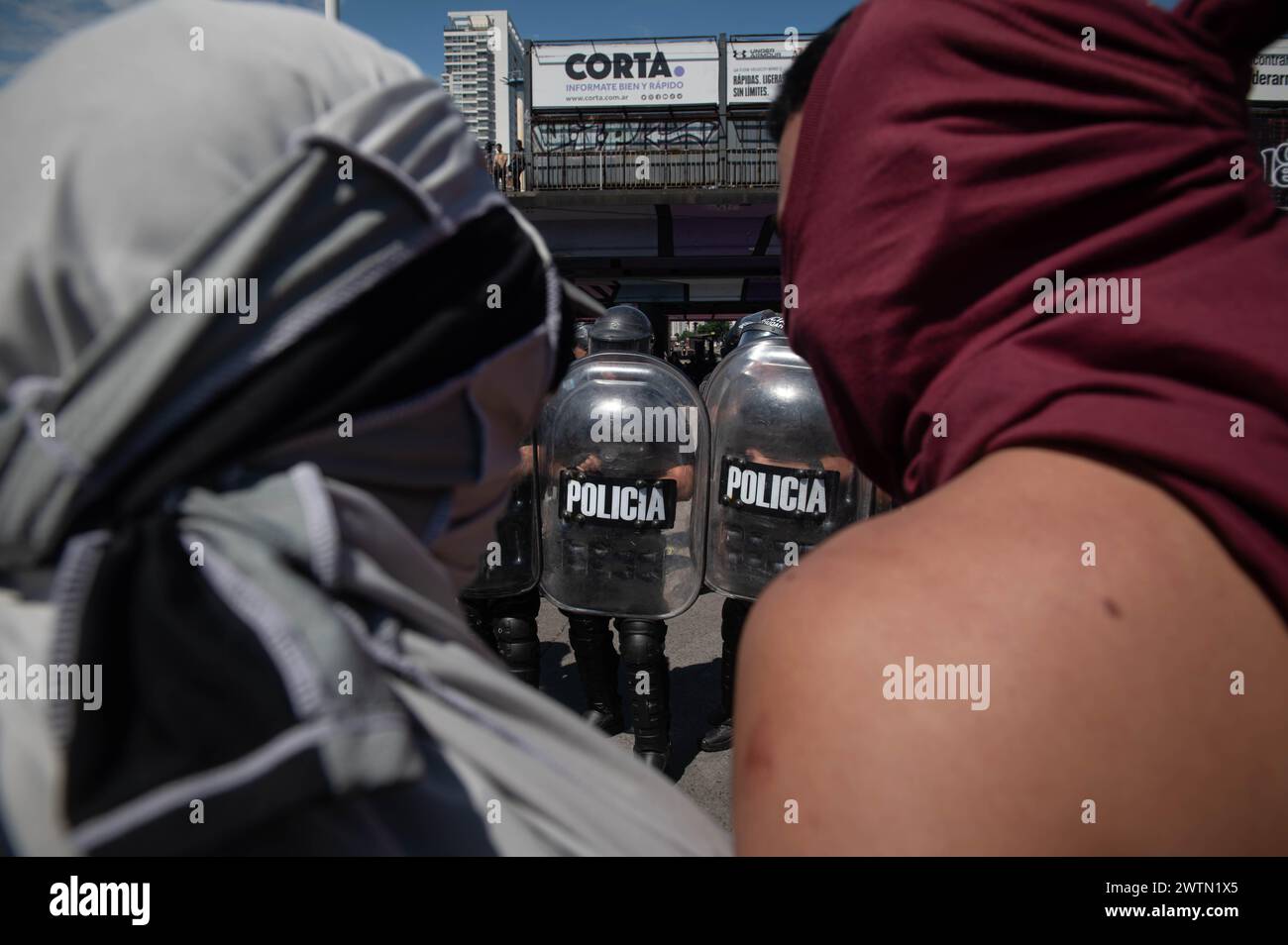 Hooded demonstrators hi-res stock photography and images - Alamy