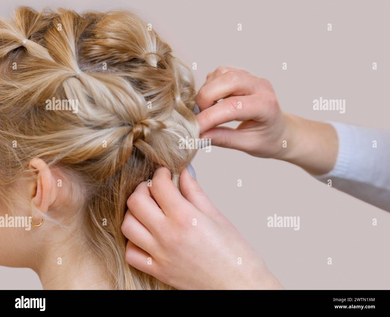 Beautiful blonde girl with a beautiful, neat hairstyle, close-up in a ...
