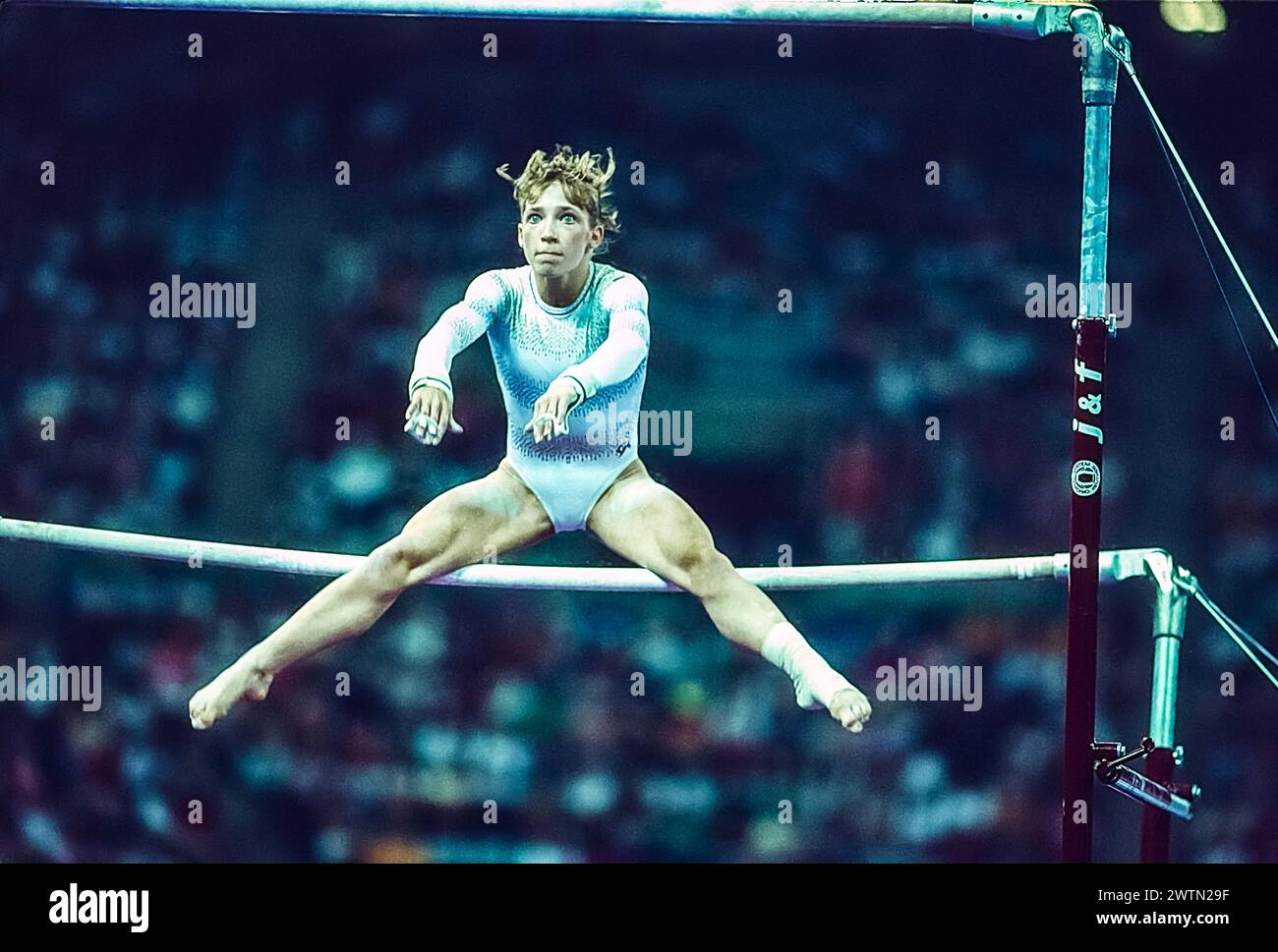 Kim Zmeskal (USA) competing in the women's artistic team all-around ...