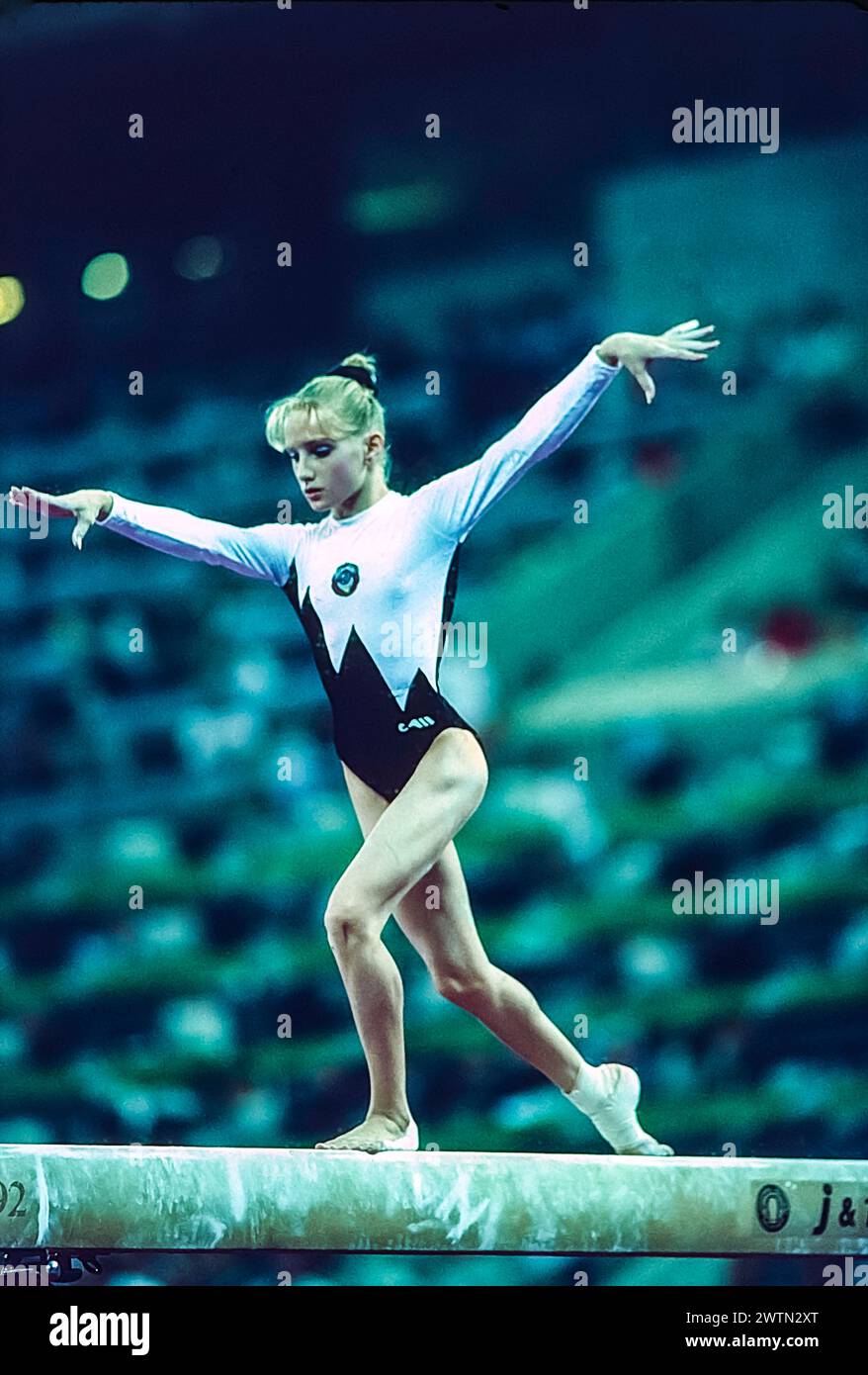 Tatiana Gutsu (EUN) competing in the women's artistic team all-around ...