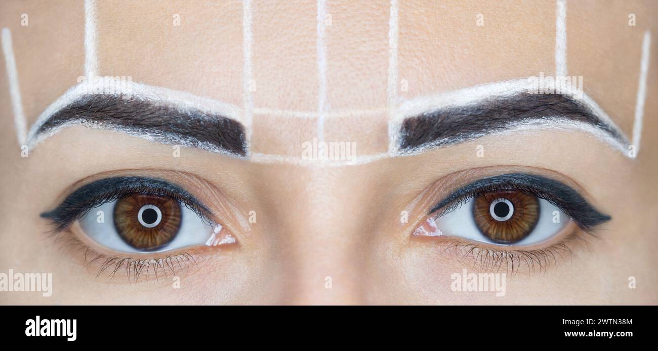 Permanent make-up for eyebrows of beautiful woman with thick brows in ...