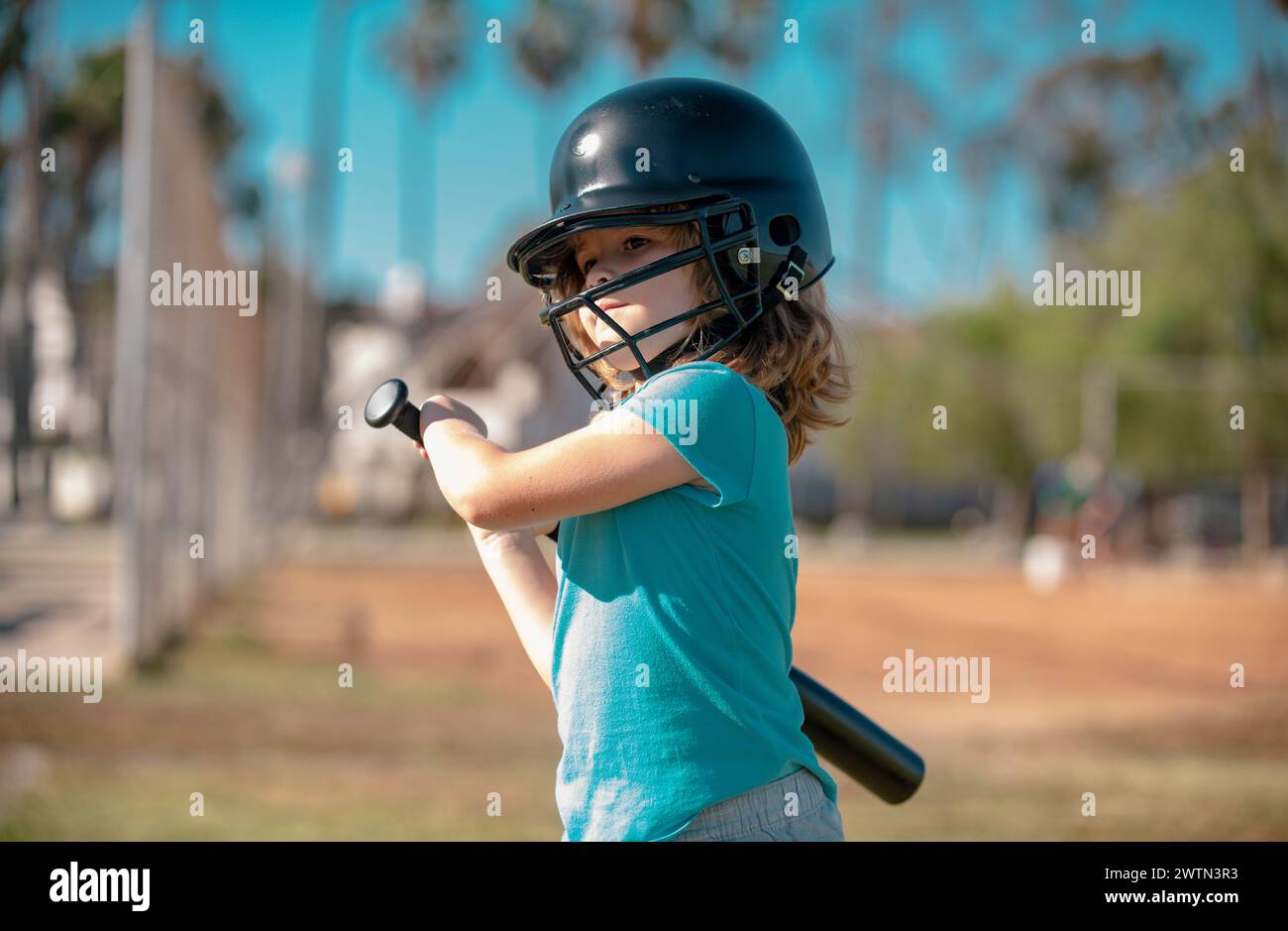 Boy kid holding a baseball bat. Pitcher child about to throw in youth ...