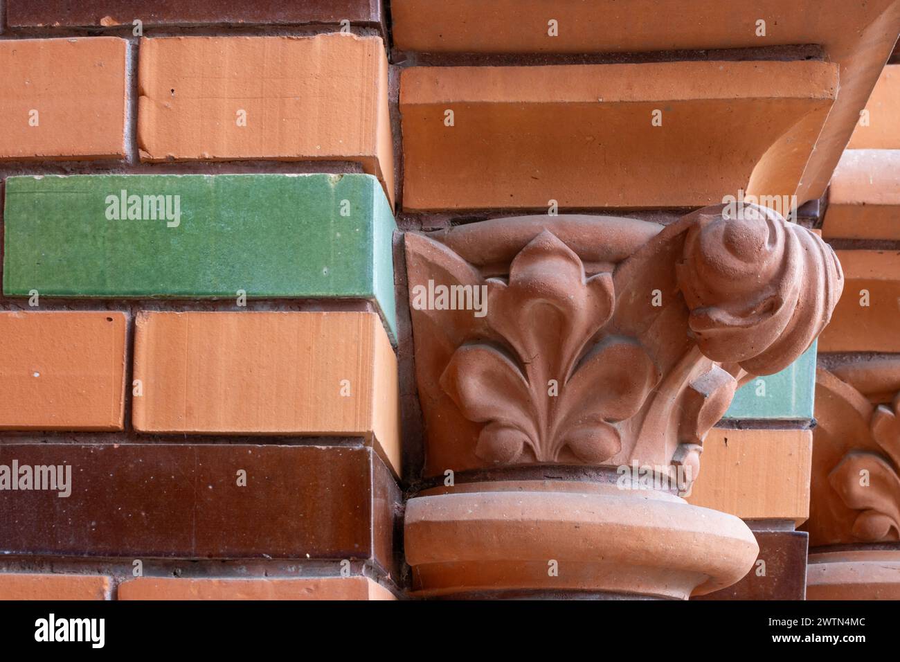 Ornate facade details, made of brick tiles, of the Church of Visitation ...