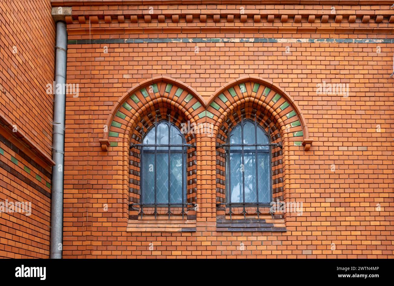 Arch windows in the facade, made of brick tiles, of the Church of ...