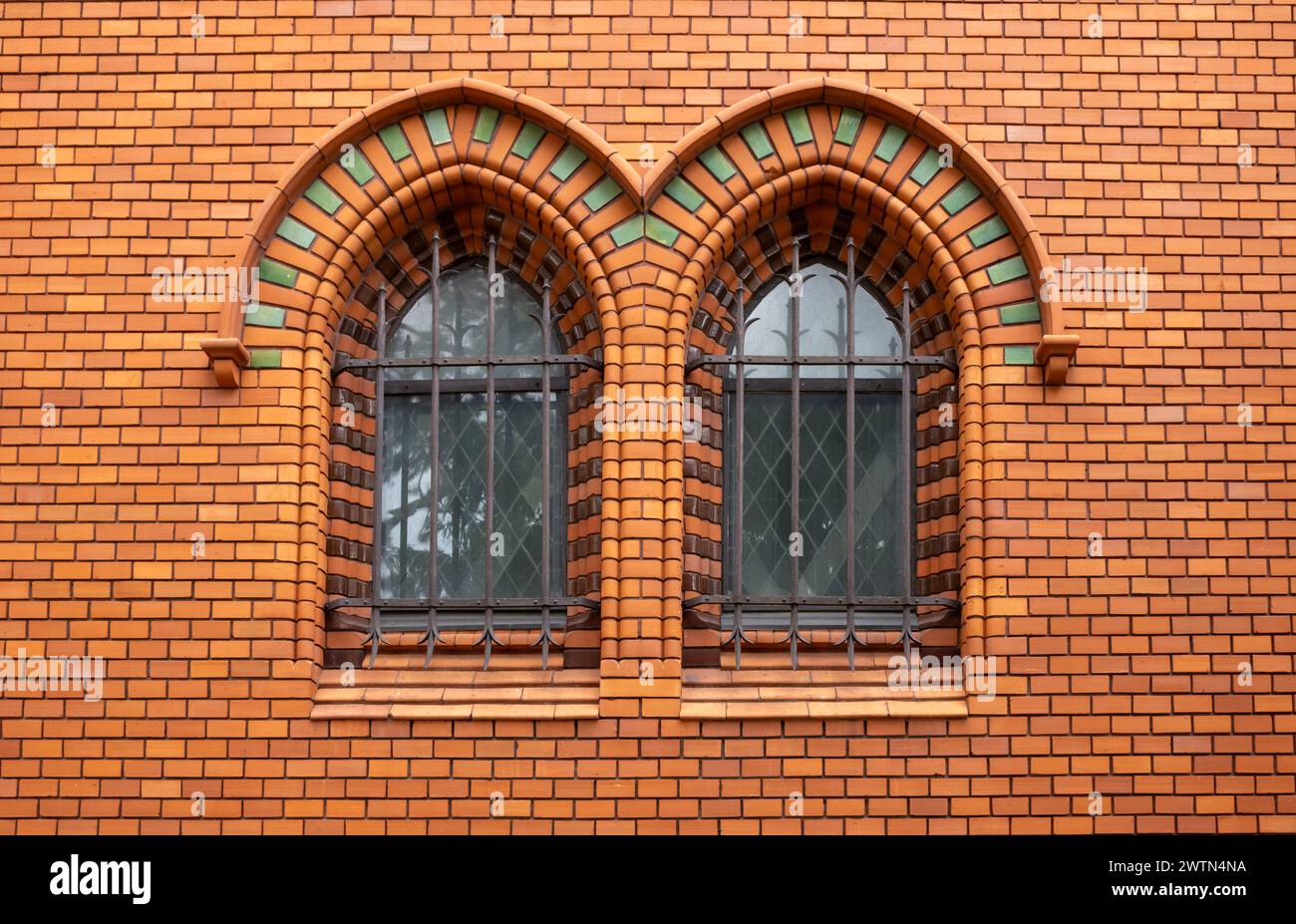 Arch windows in the facade, made of brick tiles, of the Church of ...