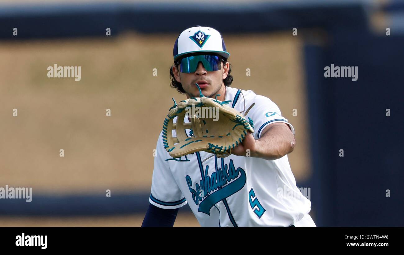 UNC Wilmington outfielder Alec DeMartino catches before an NCAA ...