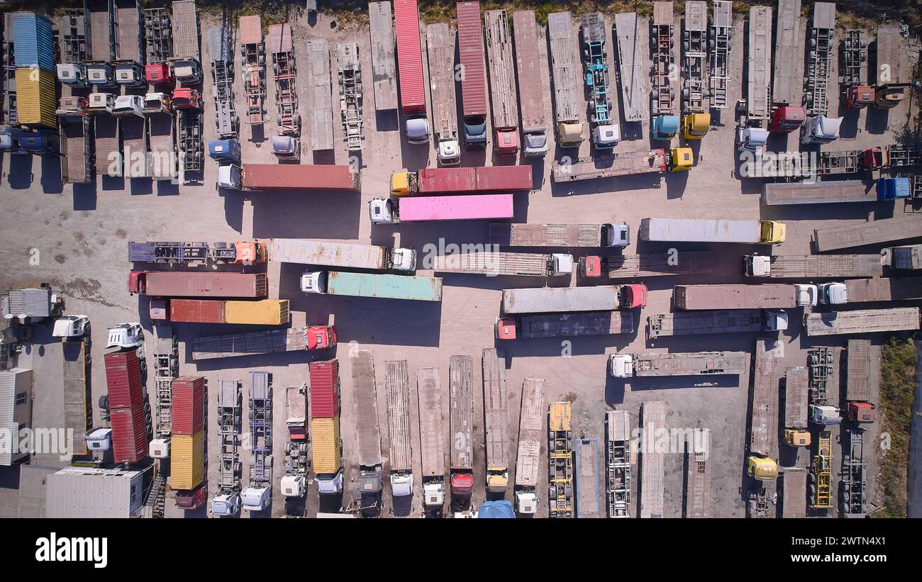 Parking of cargo container trucks Stock Photo - Alamy