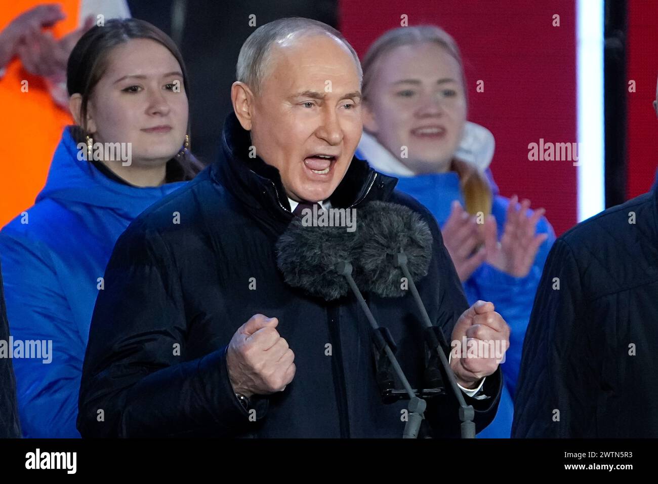 Russian President Vladimir Putin gestures while addressing a crowd at a ...